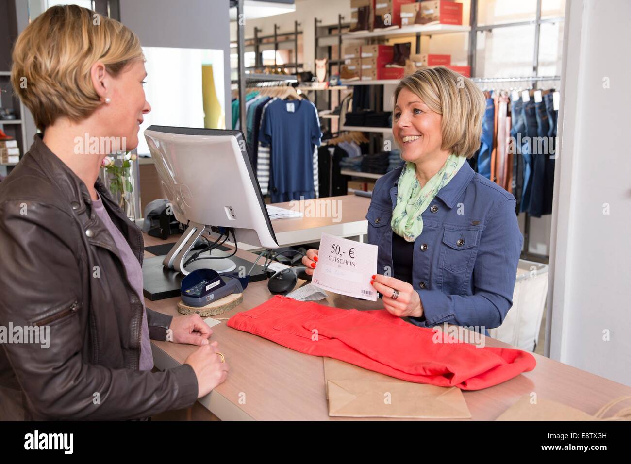 Customer returning clothes hi-res stock photography and images - Alamy