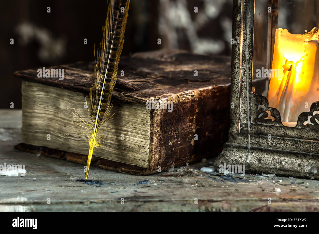 Vintage lamp for the candle and old books on wooden table Stock Photo ...