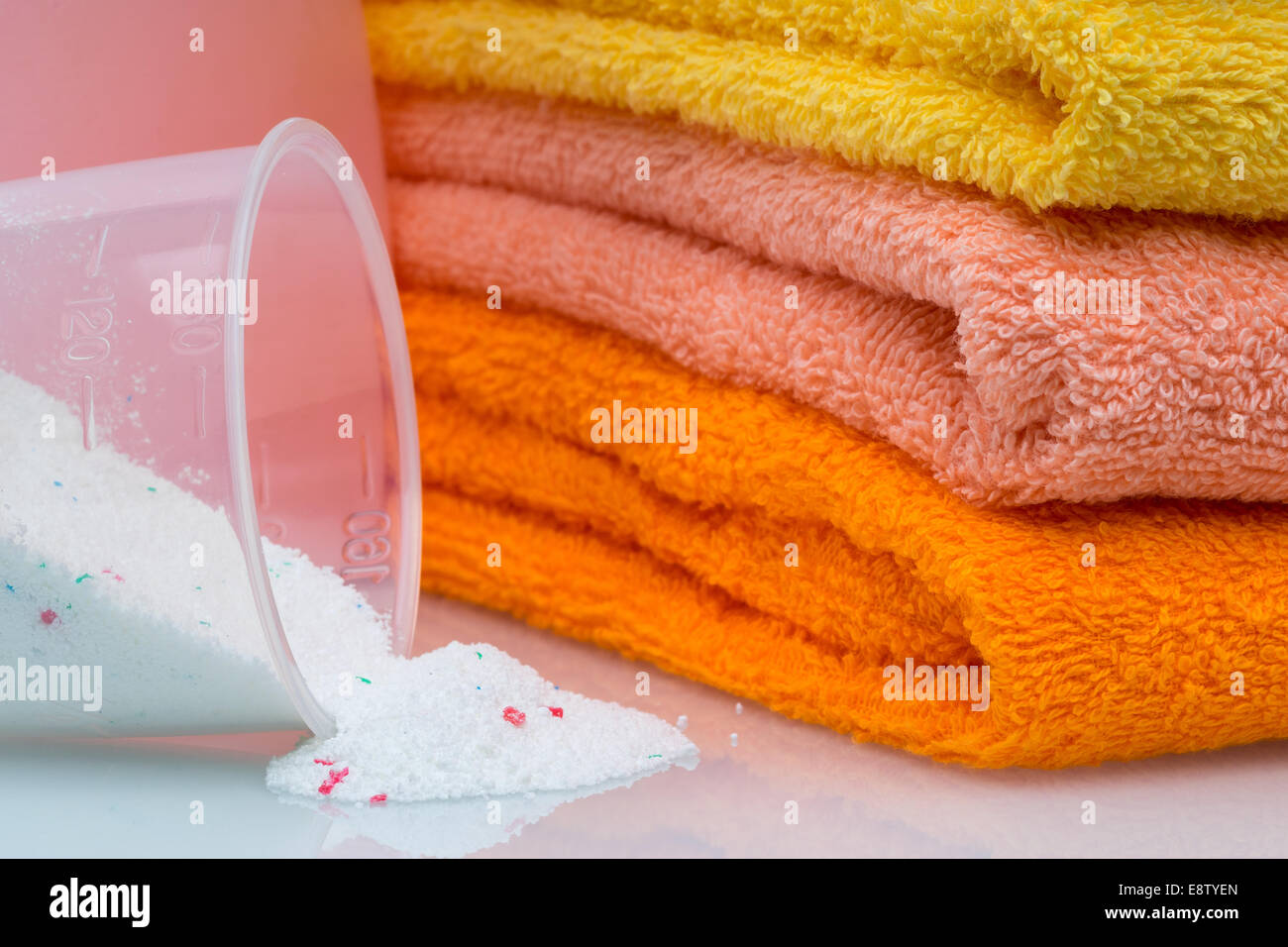 Detergent for washing machine laundry with towel Stock Photo - Alamy