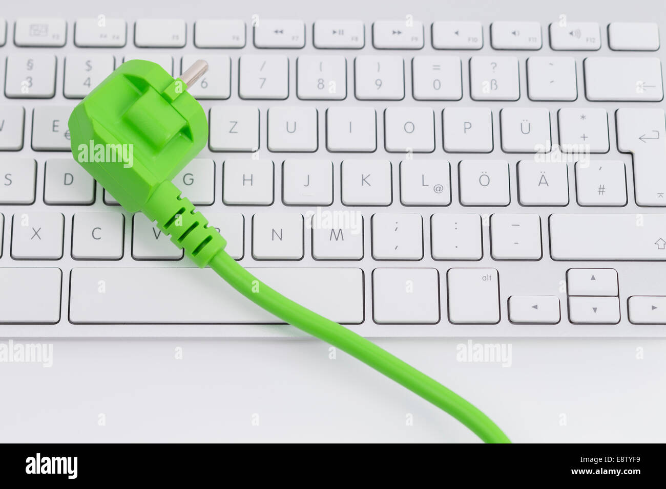 Green power plugin a keyboard isolated on white background Stock Photo ...