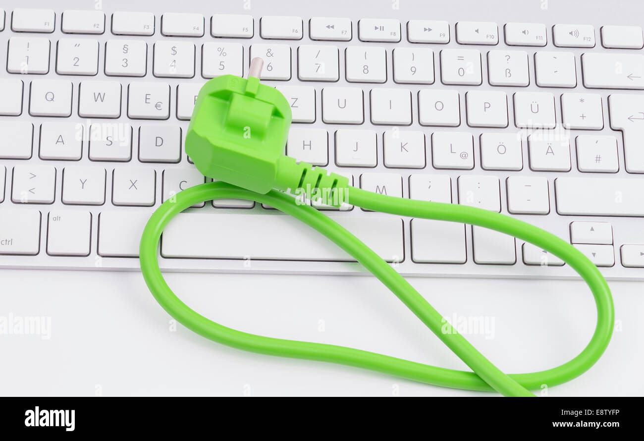 Green power plugin a keyboard isolated on white background Stock Photo ...