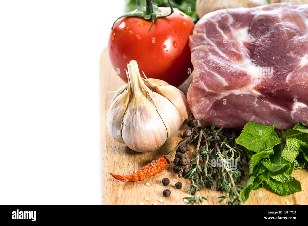 Food. Raw Meat for barbecue with fresh Vegetables and Mushrooms on ...