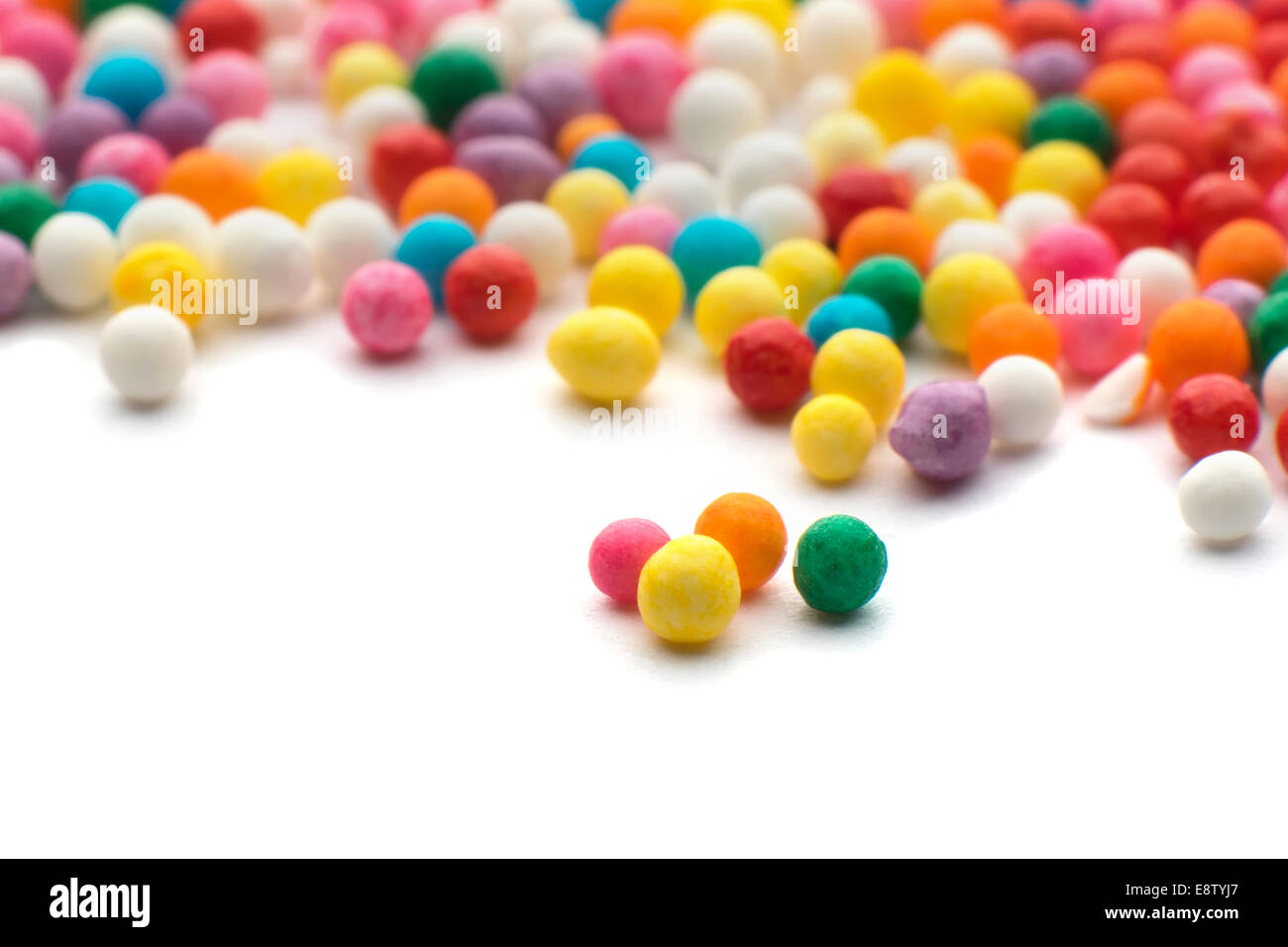 Colorful candy confetti on the white background Stock Photo - Alamy