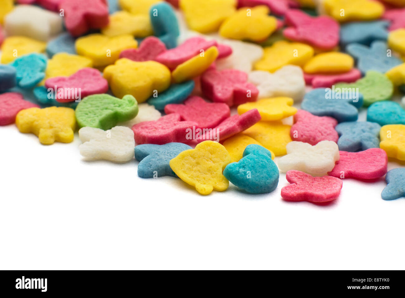 Colorful candy confetti on the white background Stock Photo - Alamy