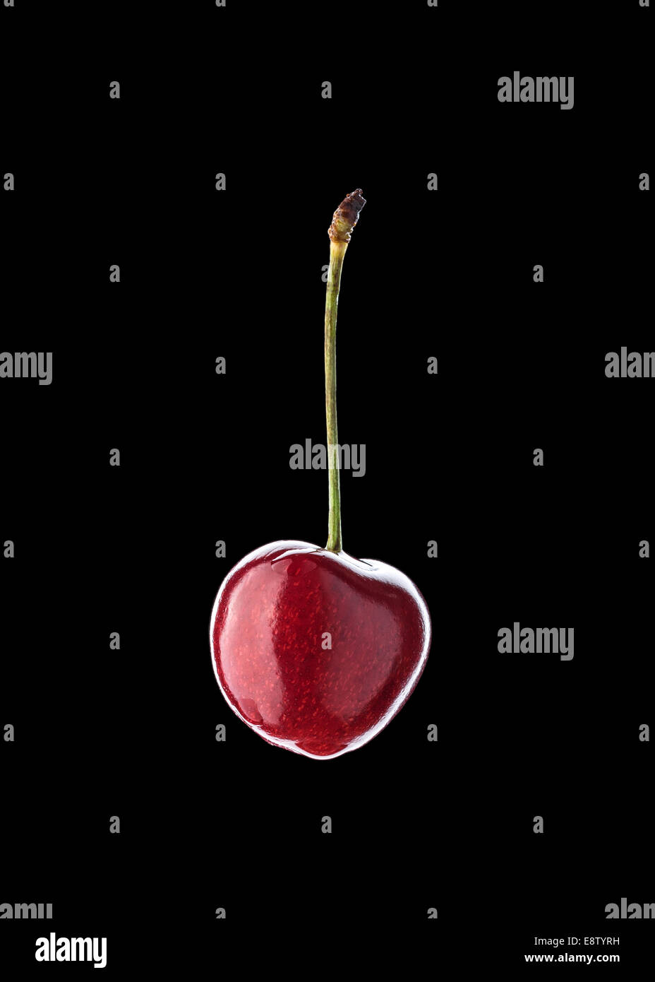 Cherry isolated on black background Stock Photo - Alamy