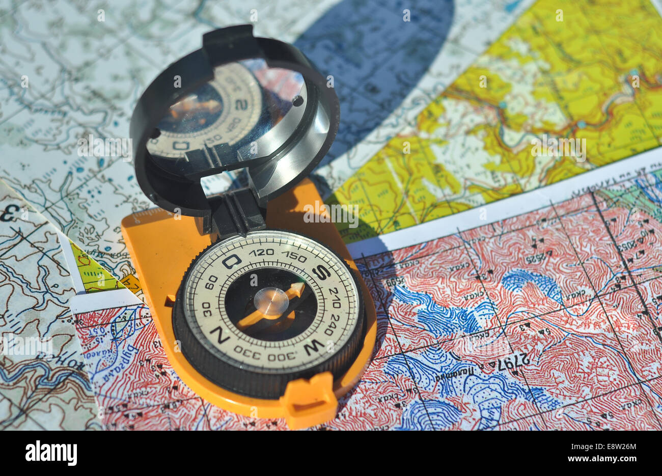 The compass on the map. Open the compass lies on topographic maps and ...