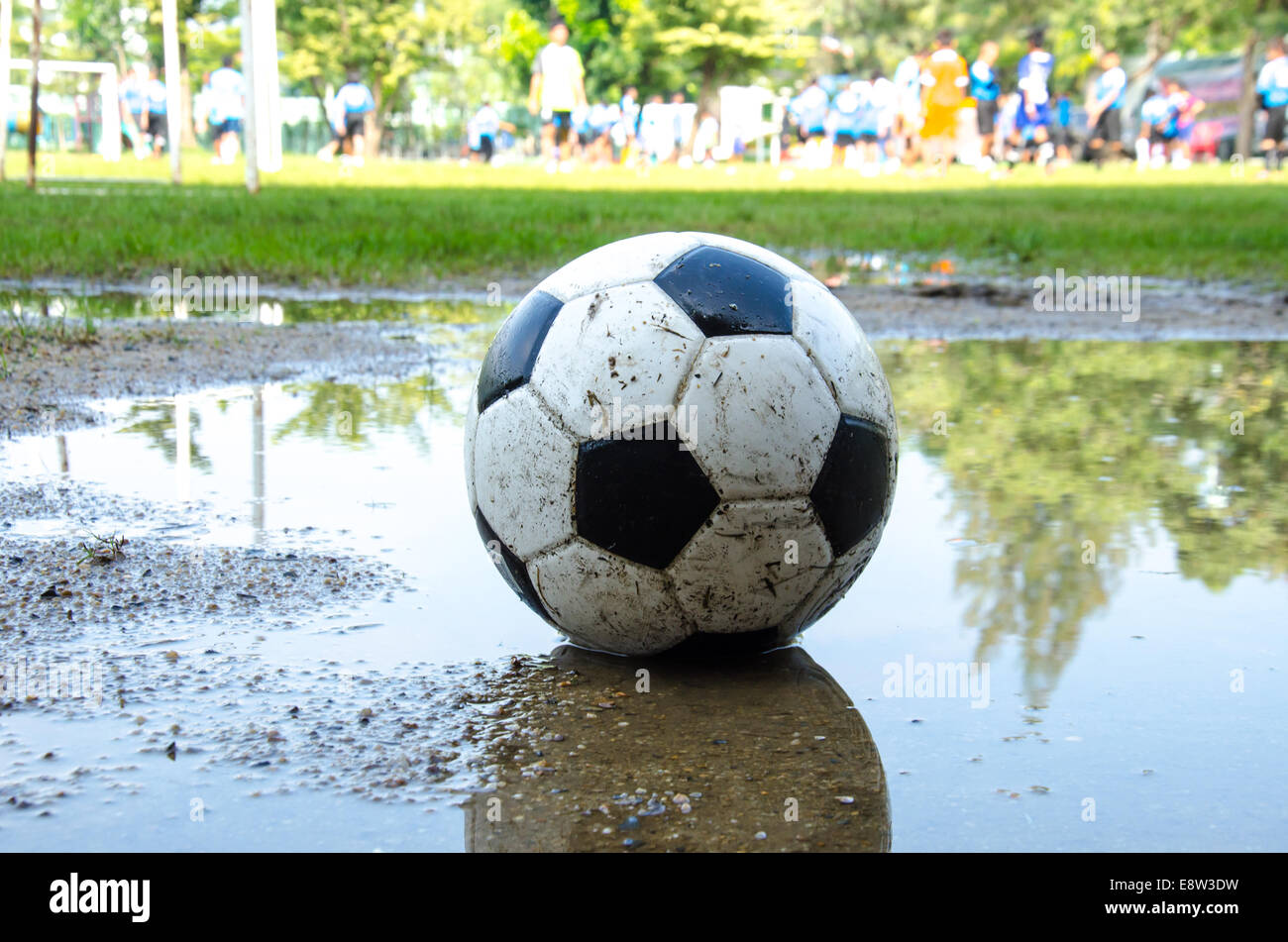 dirty soccer on dirty ground for play in rainy season Stock Photo - Alamy