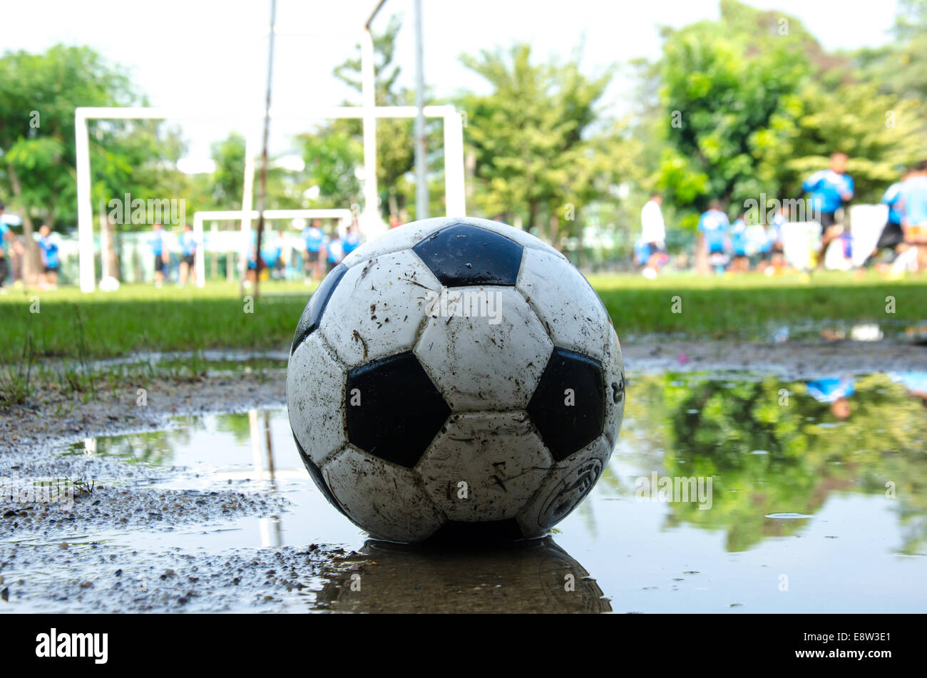 dirty soccer on dirty ground for play in rainy season Stock Photo - Alamy