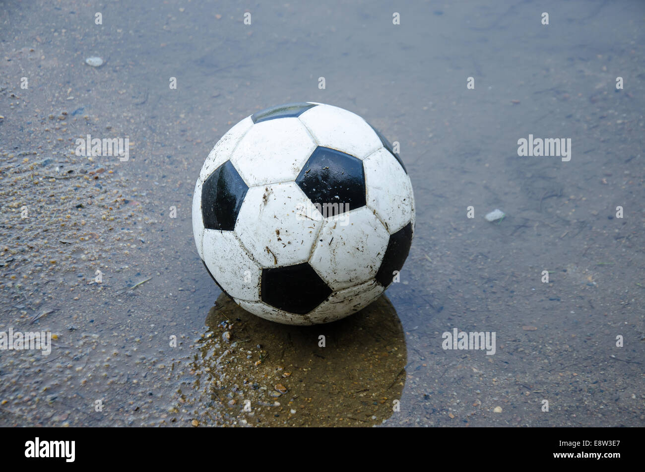 dirty soccer on dirty ground for play in rainy season Stock Photo - Alamy