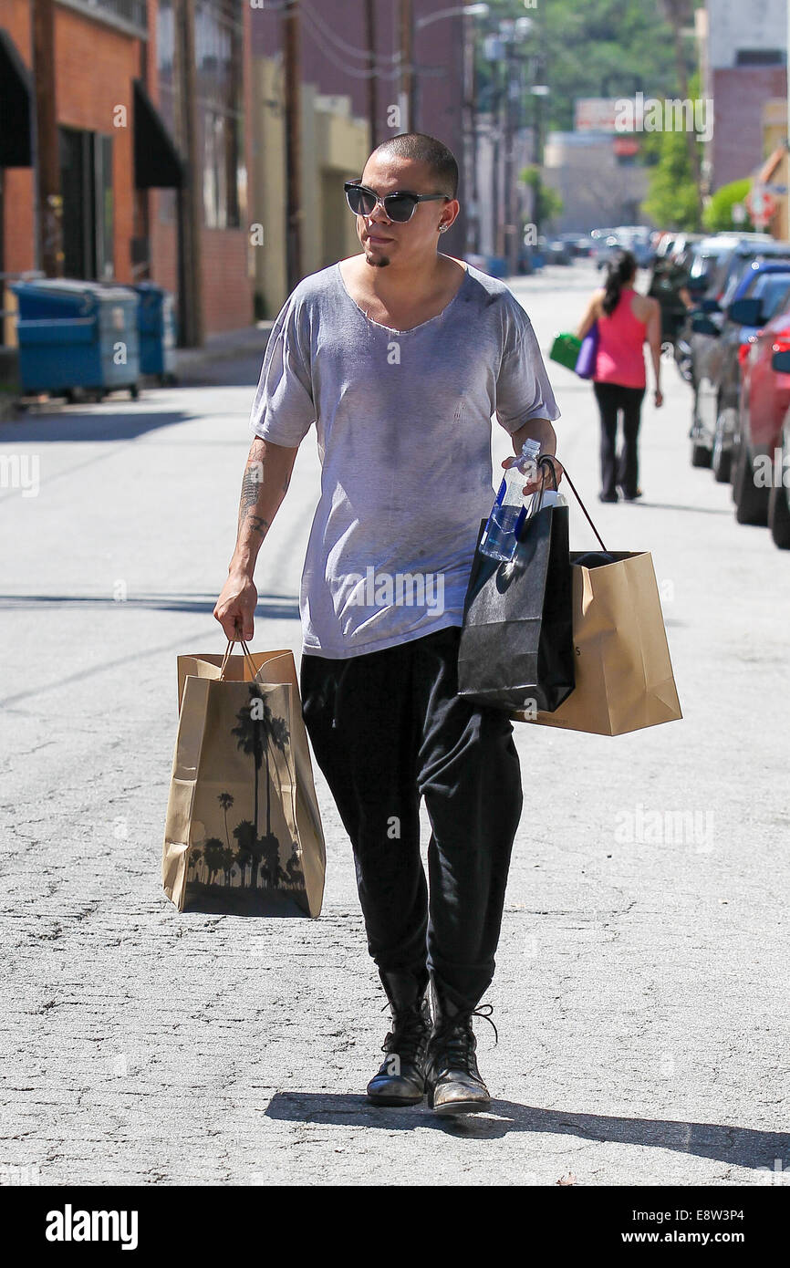Evan Ross shopping on Ventura Boulevard in Studio City with a large bag ...