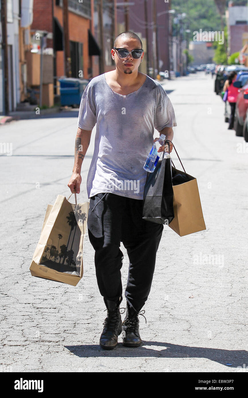 Evan Ross shopping on Ventura Boulevard in Studio City with a large bag ...