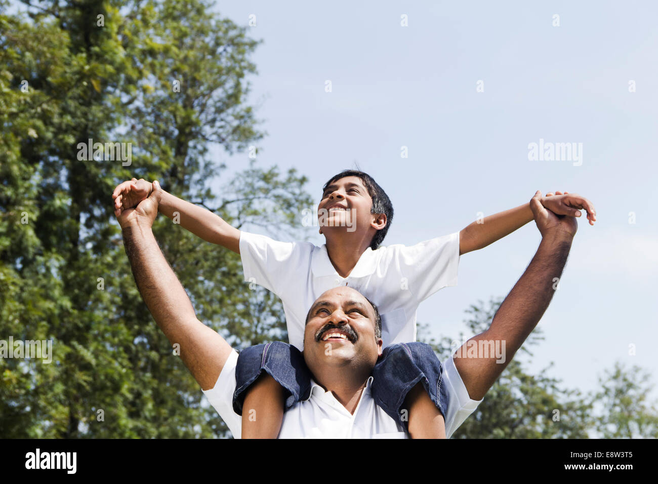 1 India Man Playful With Kid Stock Photo - Alamy