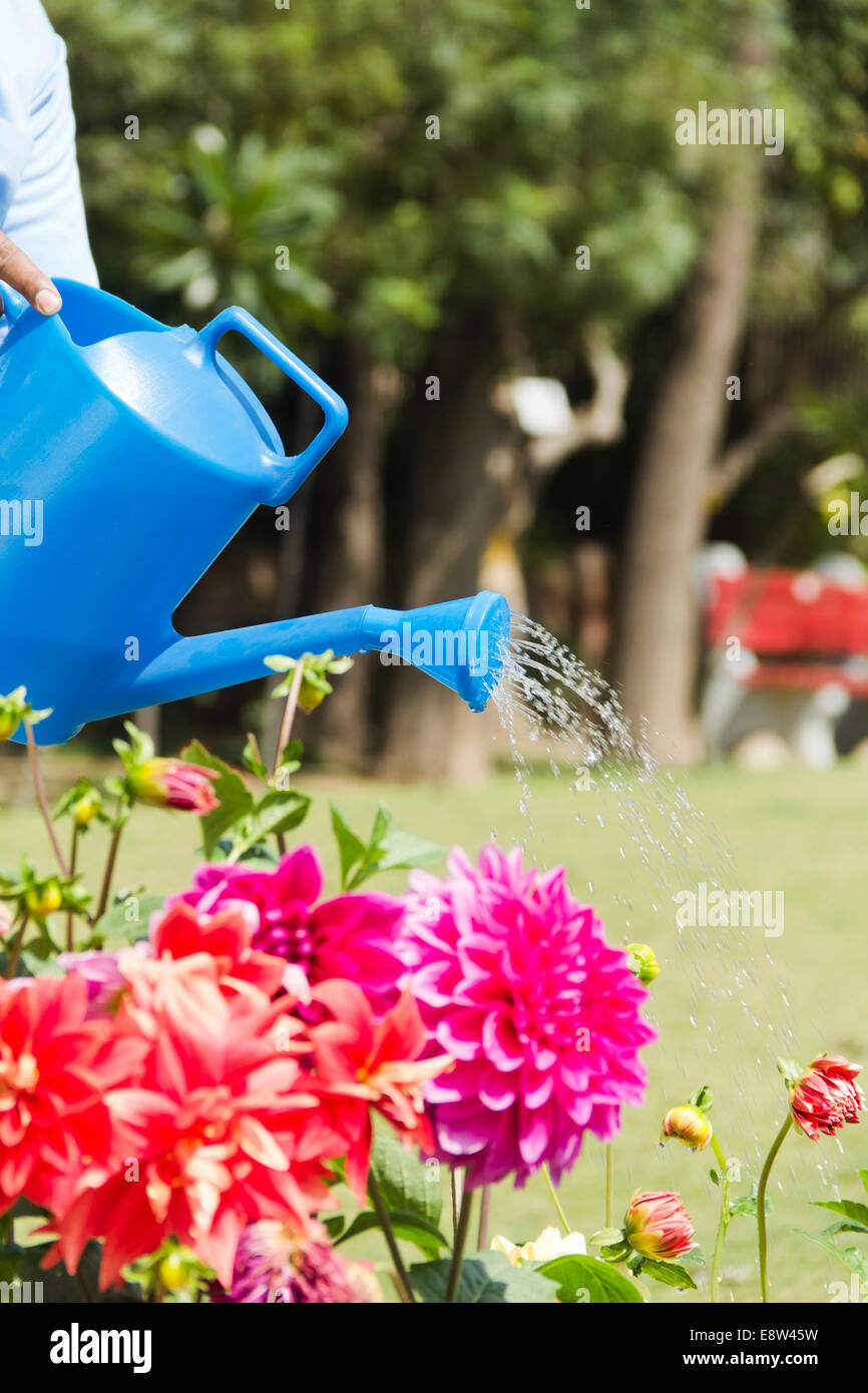 1 Indian Man Spraying Water Stock Photo - Alamy