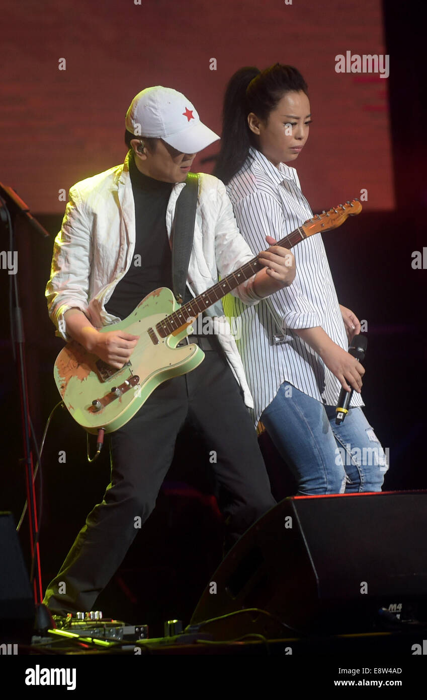 Beijing, China. 14th Oct, 2014. Singer Cui Jian (L) and Susan Huang ...