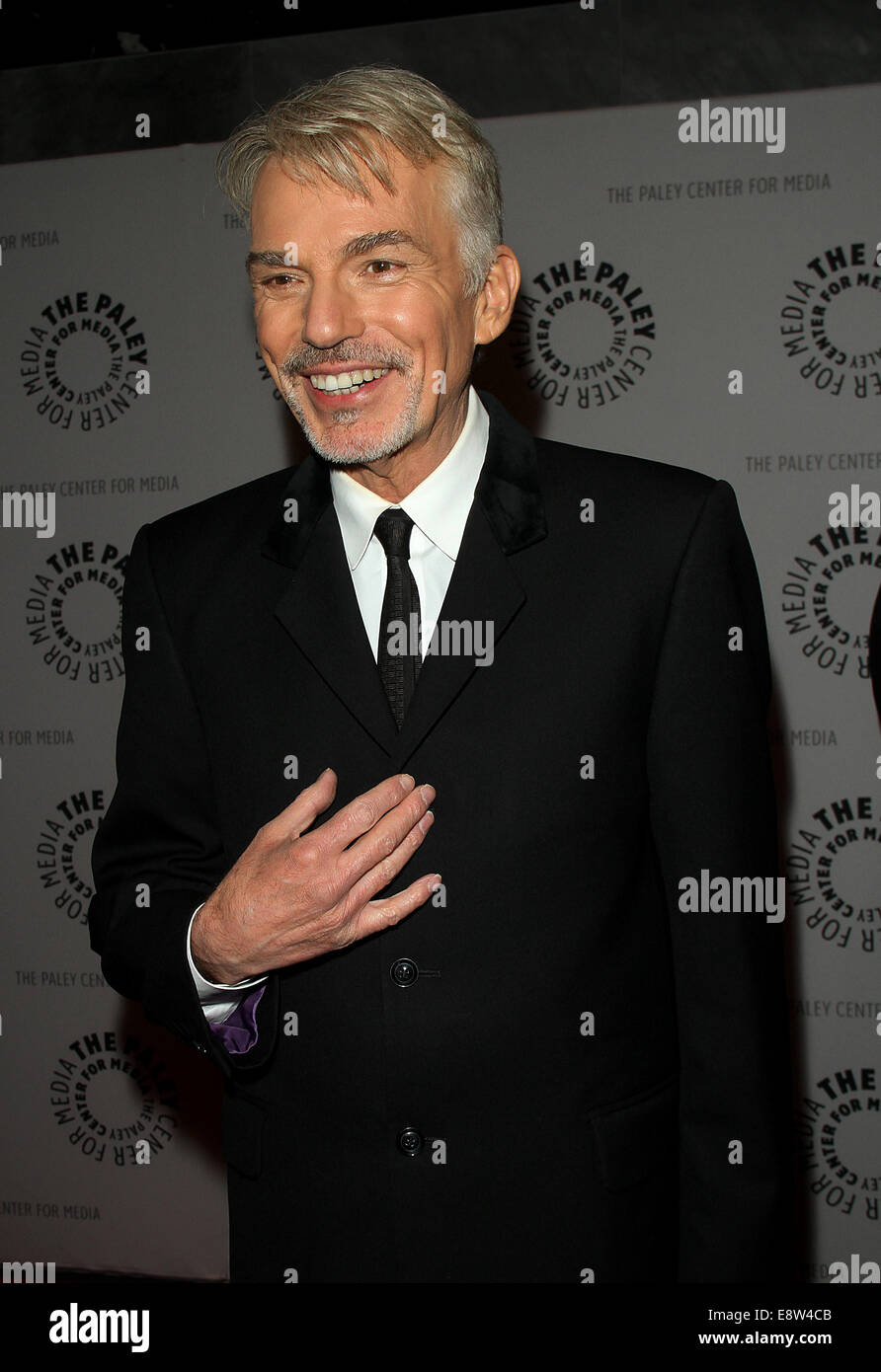 Celebrities pose for photographers on the red carpet, as they arrive ...