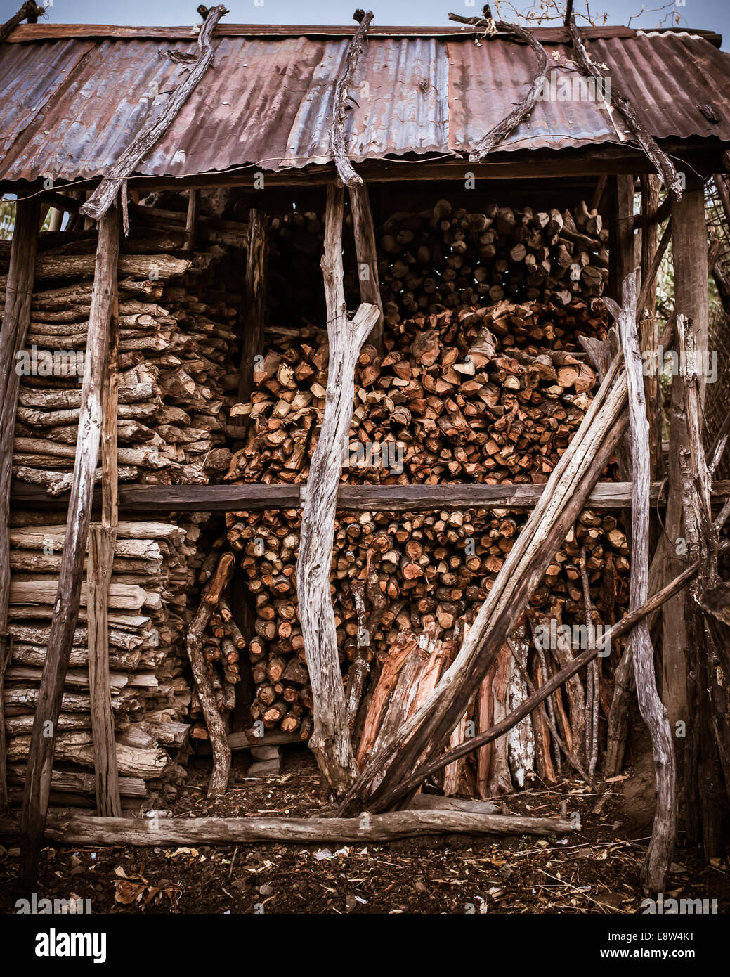 Firewood stack in northern Myanmar Stock Photo - Alamy