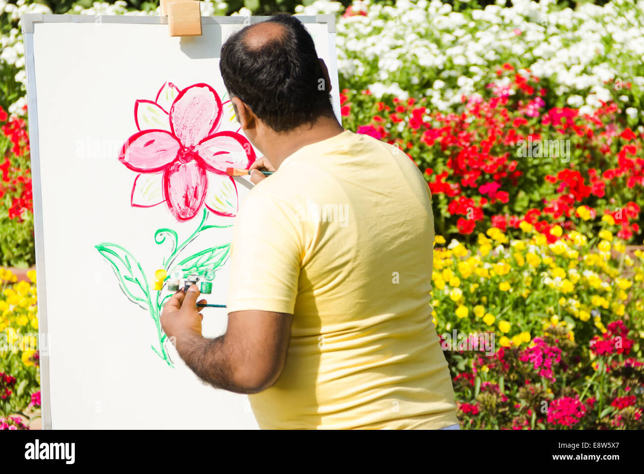 Rear view man painting hi-res stock photography and images - Alamy