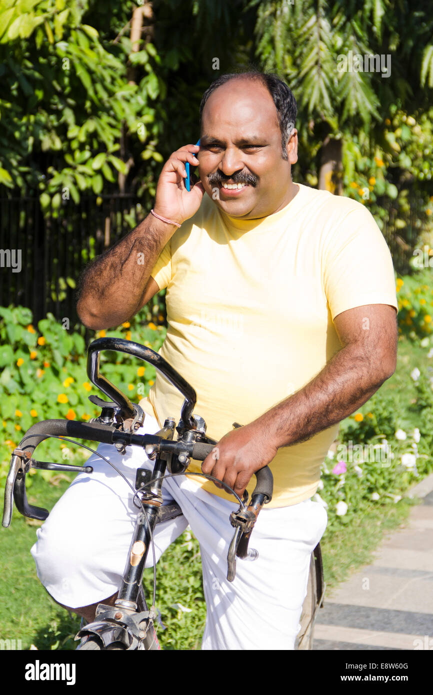 Man ride cycle in park hi-res stock photography and images - Alamy
