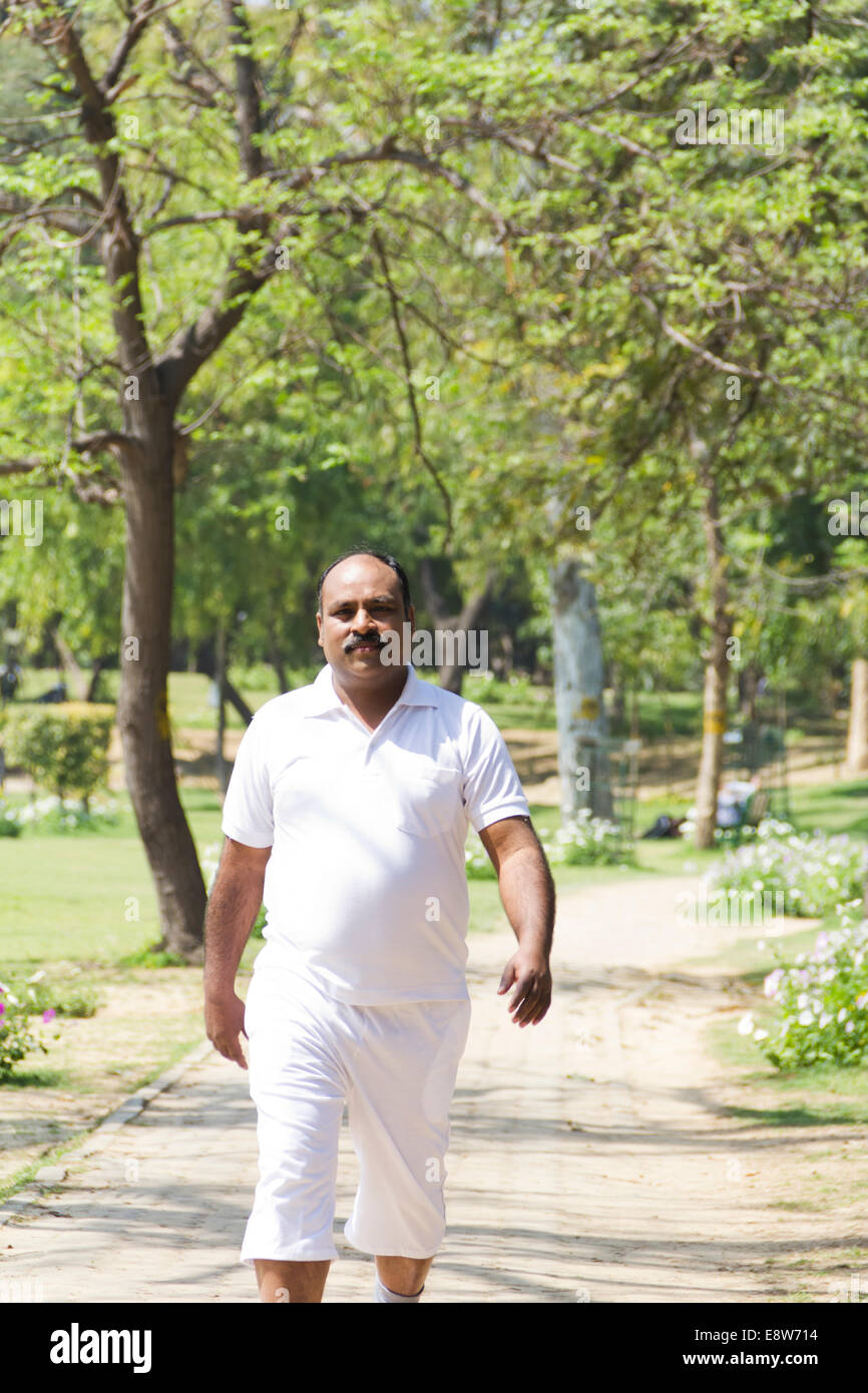 1 Indian Man Walking in Morning Stock Photo - Alamy
