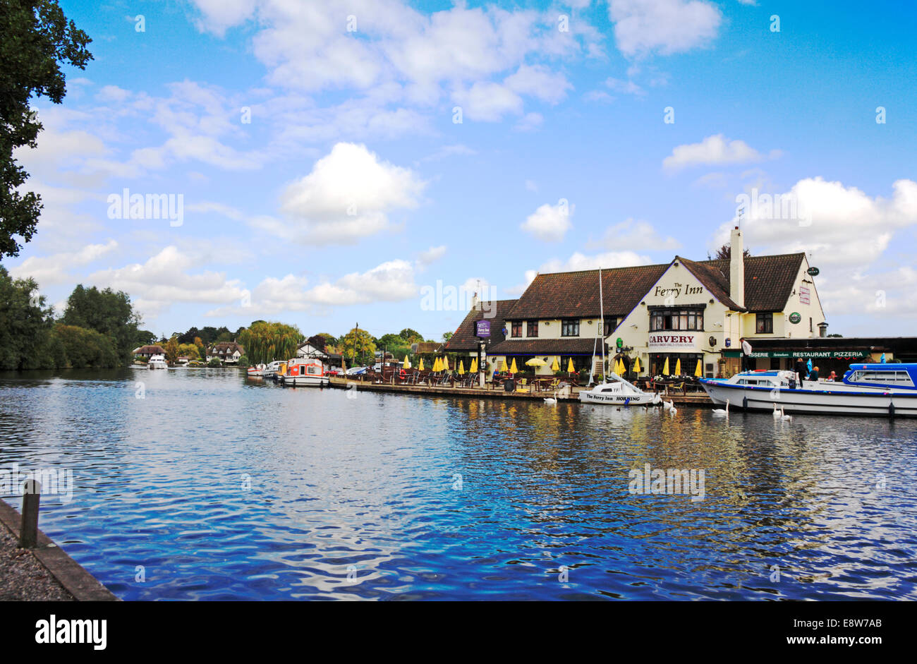 A view of the Ferry Inn by the River Bure on the Norfolk Broads at ...