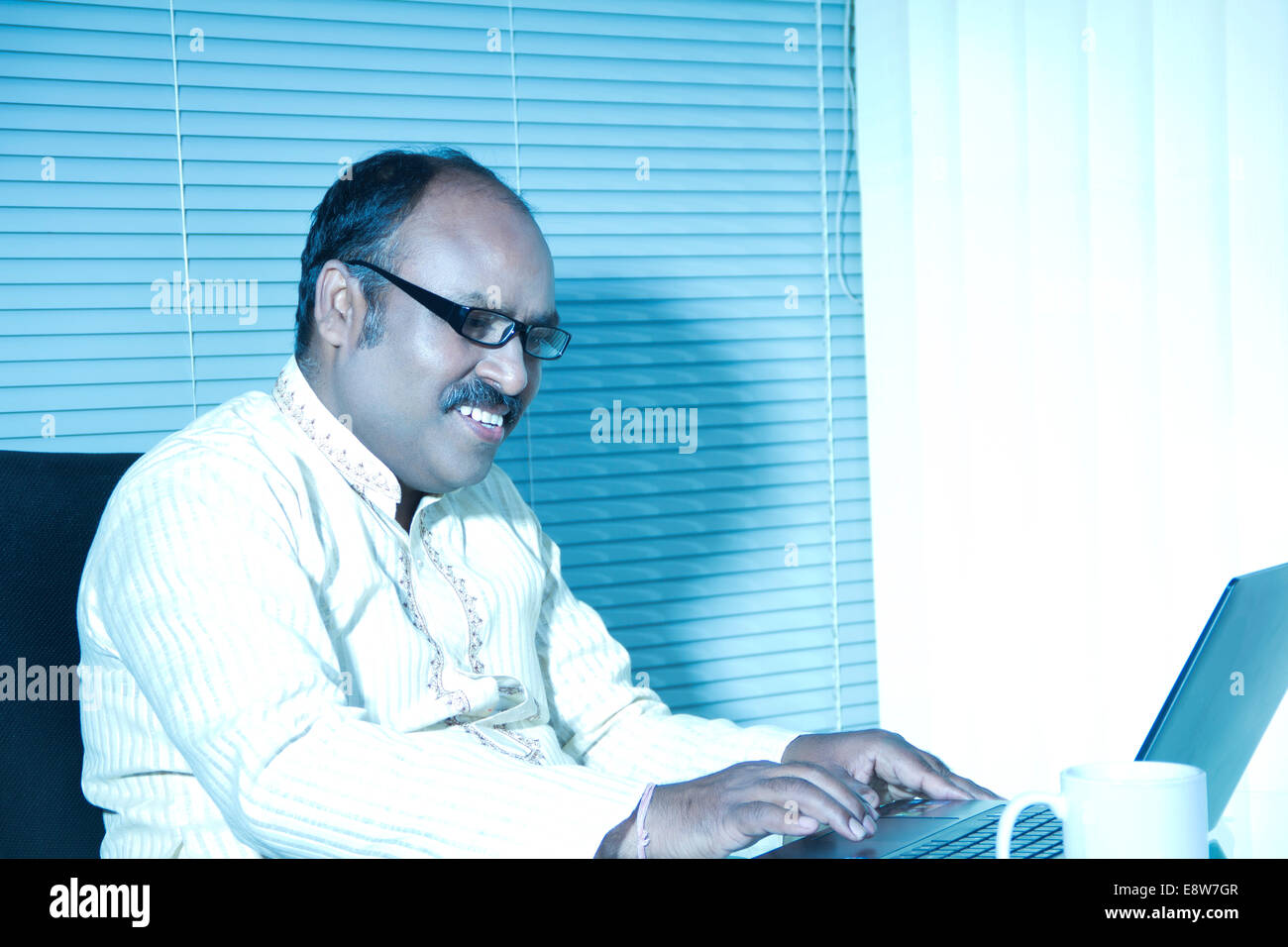 1 Indian man Working in Office Stock Photo - Alamy