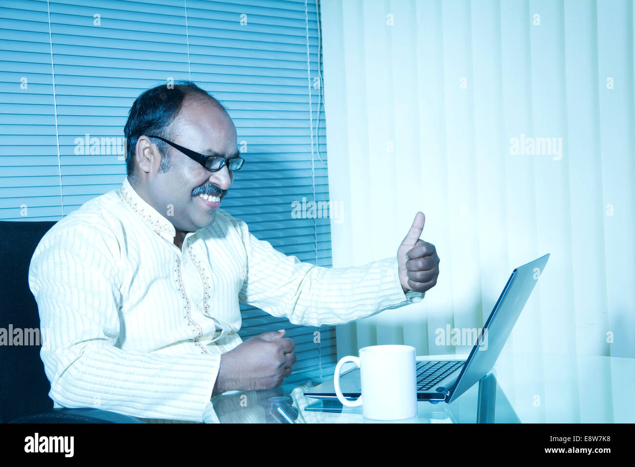 1 Indian man Working in Office Stock Photo - Alamy