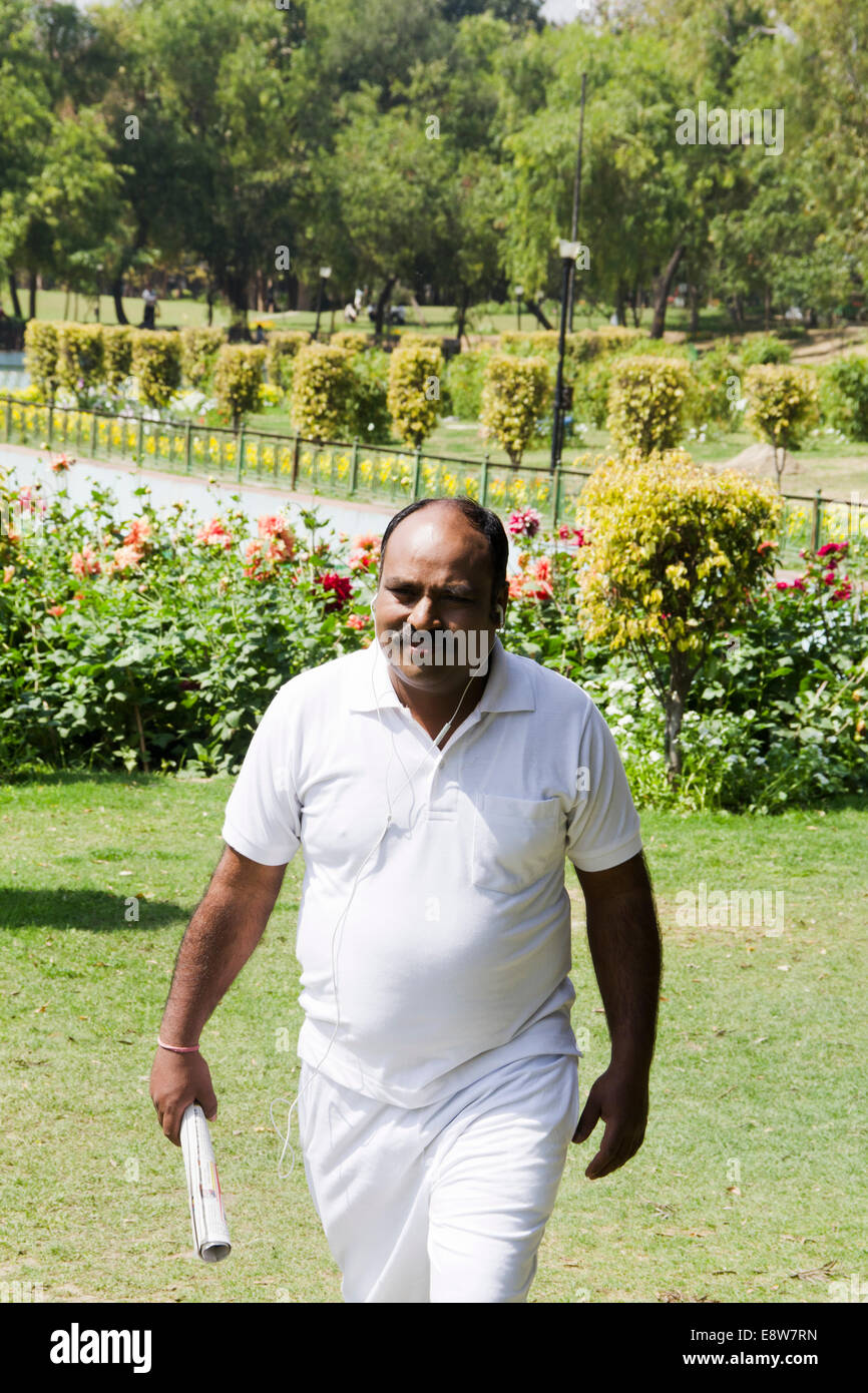 Indian man walking hi-res stock photography and images - Alamy