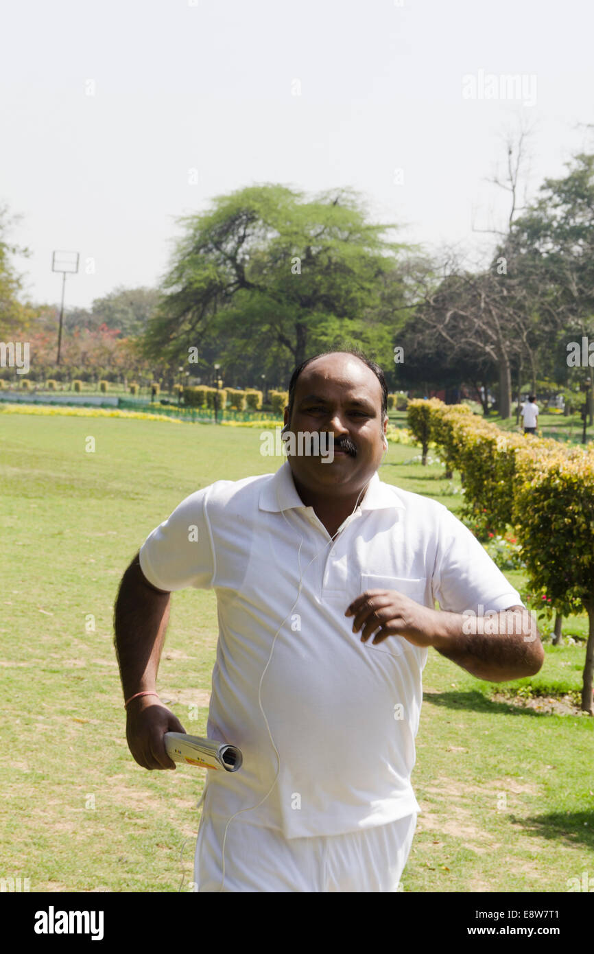 Indian man running hi-res stock photography and images - Alamy