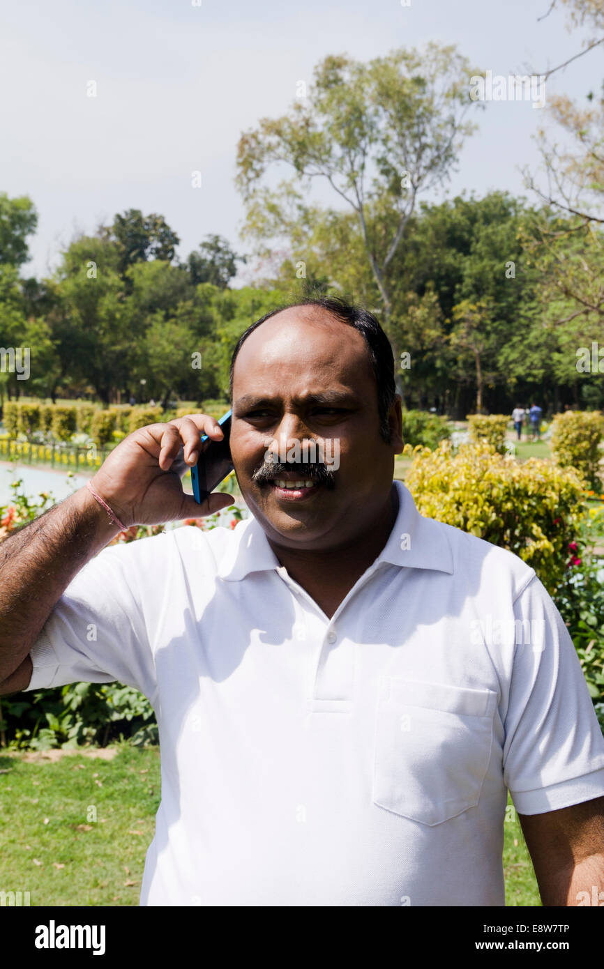 1 Indian man Talking with Mobile Stock Photo - Alamy