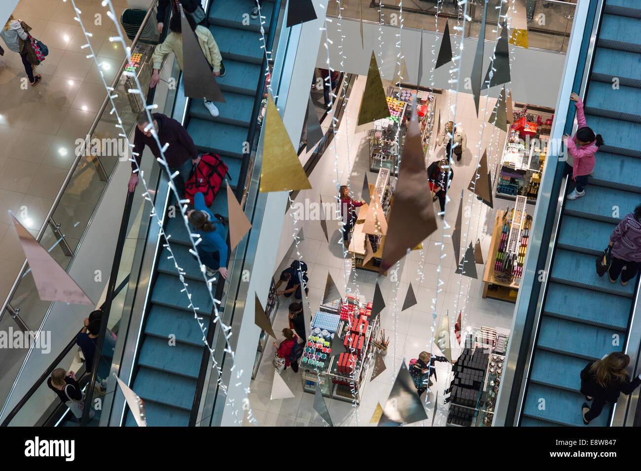 Escalators in a department store Stock Photo - Alamy