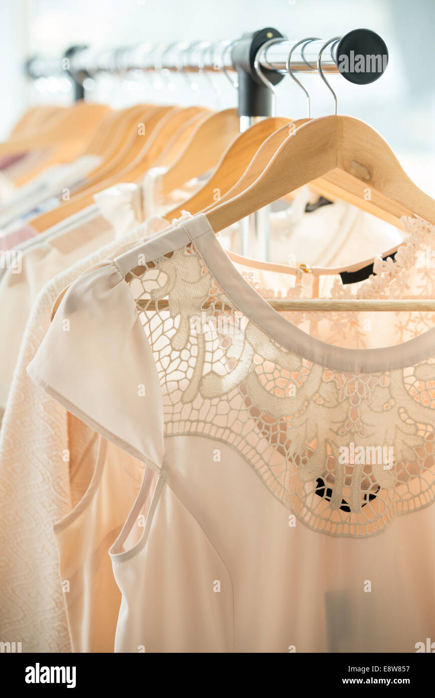 Dresses on hangers hi-res stock photography and images - Alamy