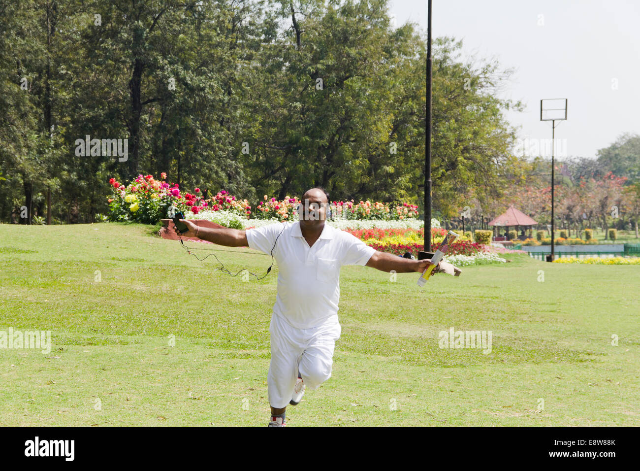 1 Indian Man Running in Park Stock Photo - Alamy