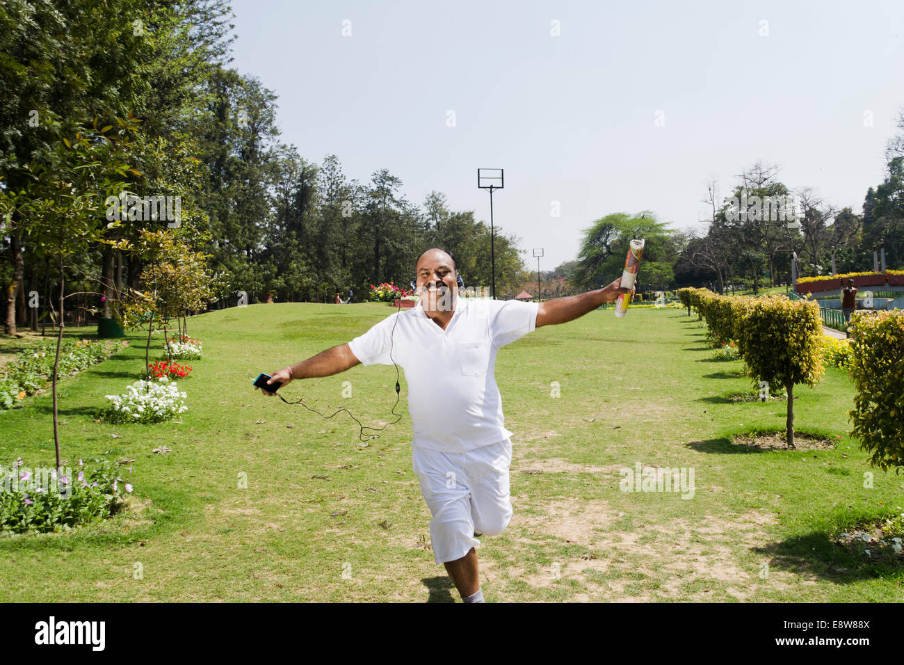 1 Indian Man Running in Park Stock Photo - Alamy