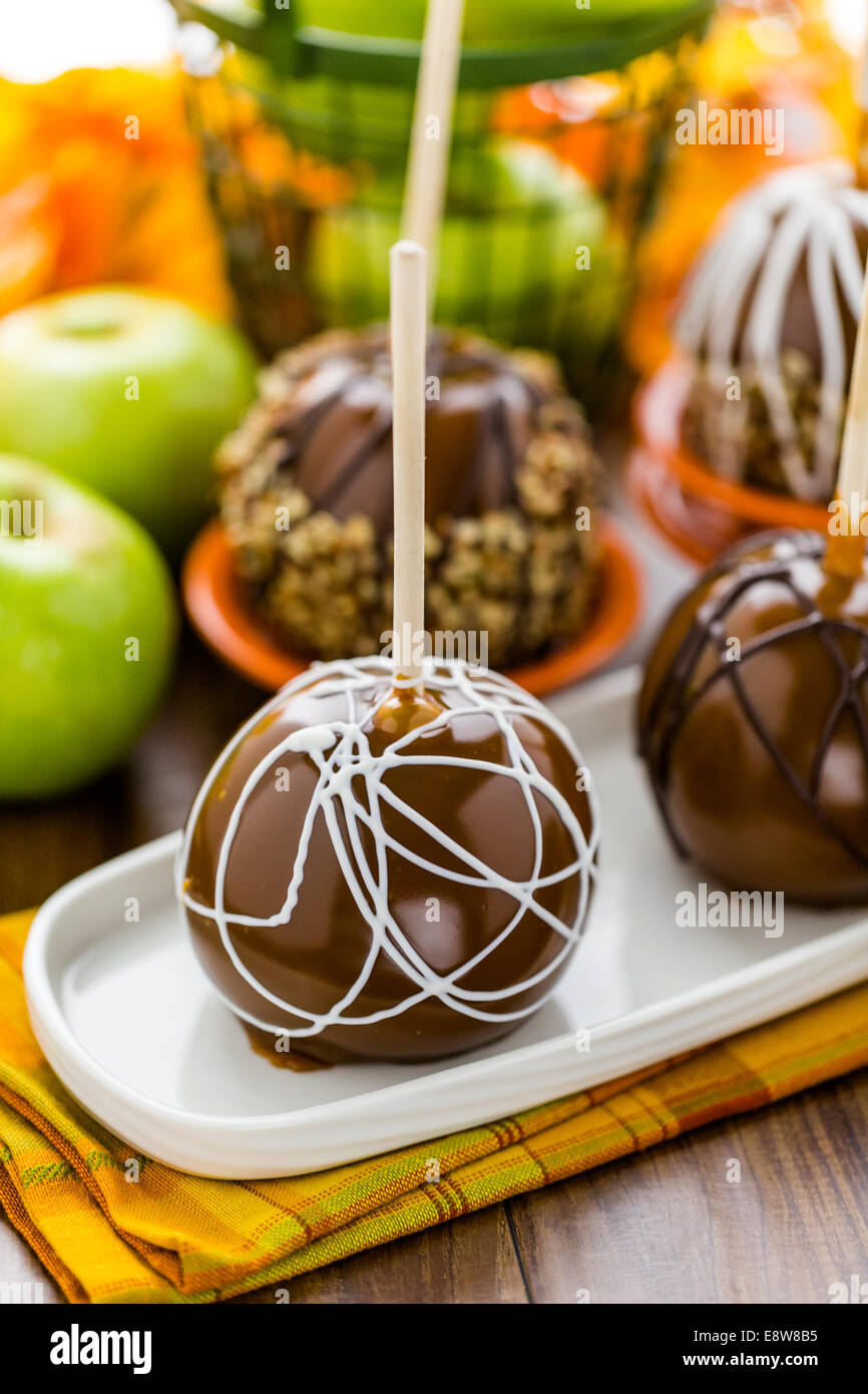 Hand dipped caramel apples decorated for Halloween Stock Photo - Alamy
