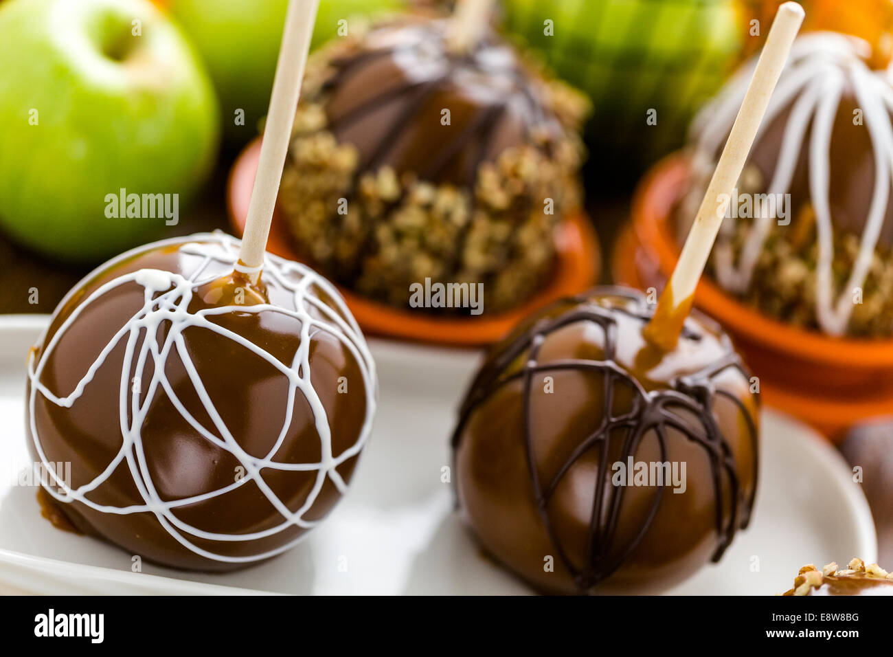 Hand dipped caramel apples decorated for Halloween Stock Photo - Alamy