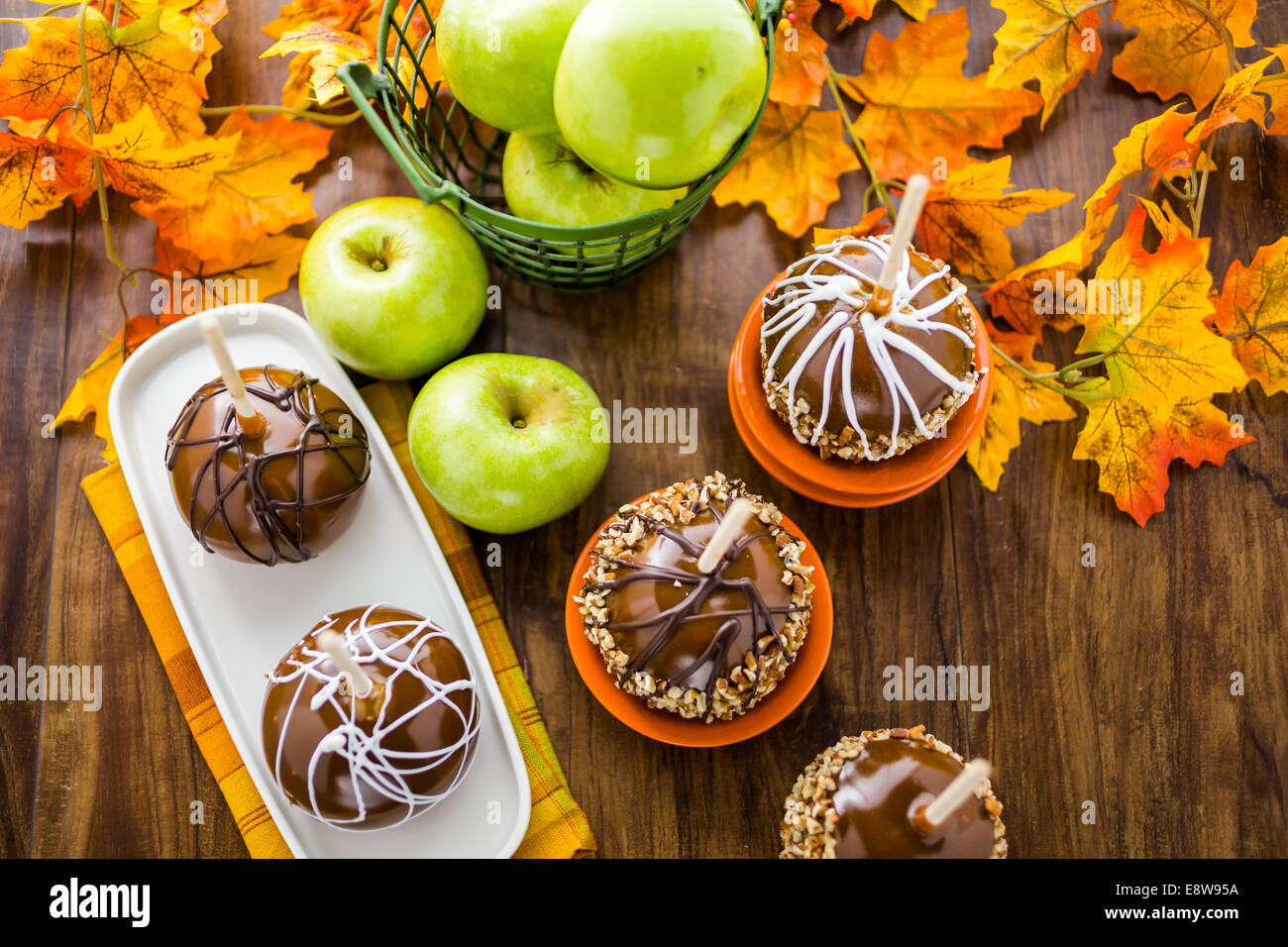 Hand dipped caramel apples decorated for Halloween Stock Photo - Alamy