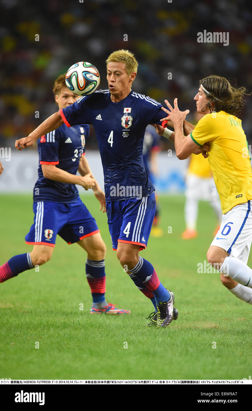 Singapore. 14th Oct, 2014. Keisuke Honda (JPN), Filipe Luis (BRA ...