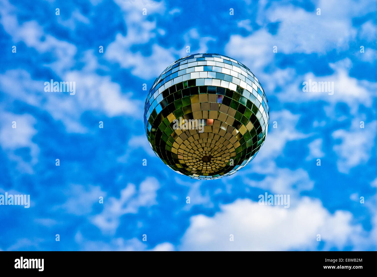 Impossible is possible. A glass reflection sphere in the air against ...