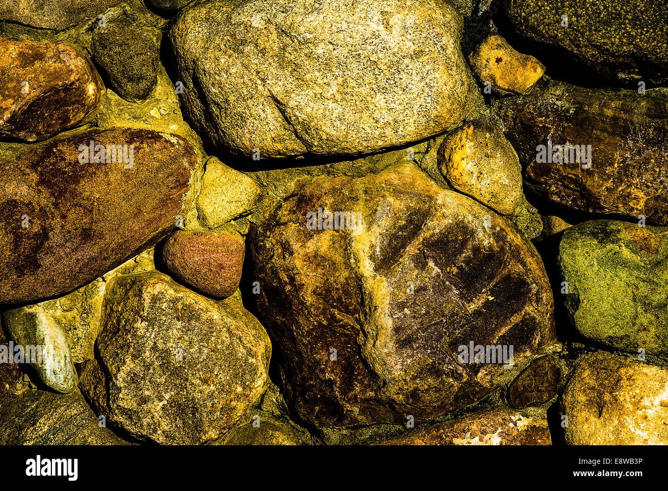 Solid Foundation. Closeup view of a stone wall Stock Photo - Alamy