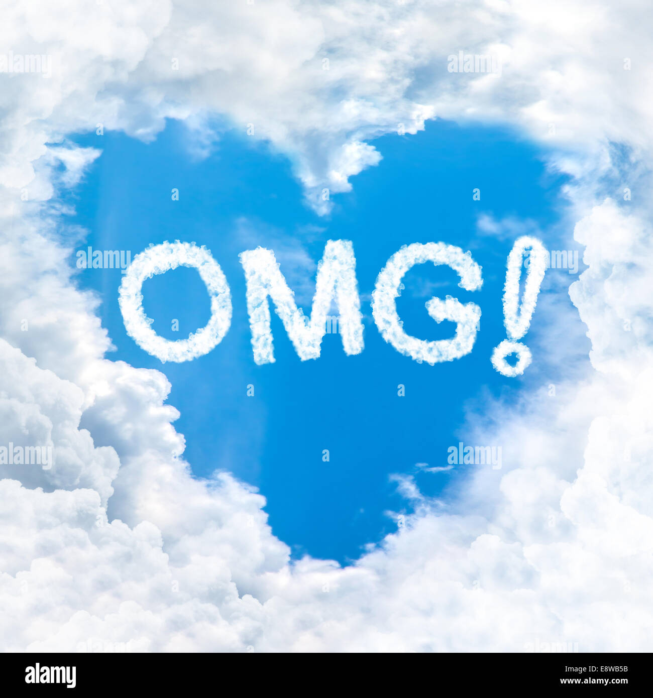 OMG word on blue sky inside heart cloud form Stock Photo - Alamy