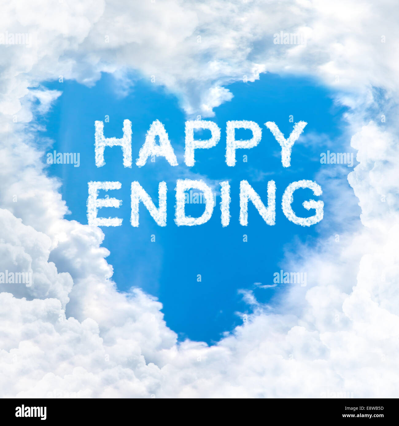 Happy ending word on blue sky inside heart cloud form Stock Photo - Alamy