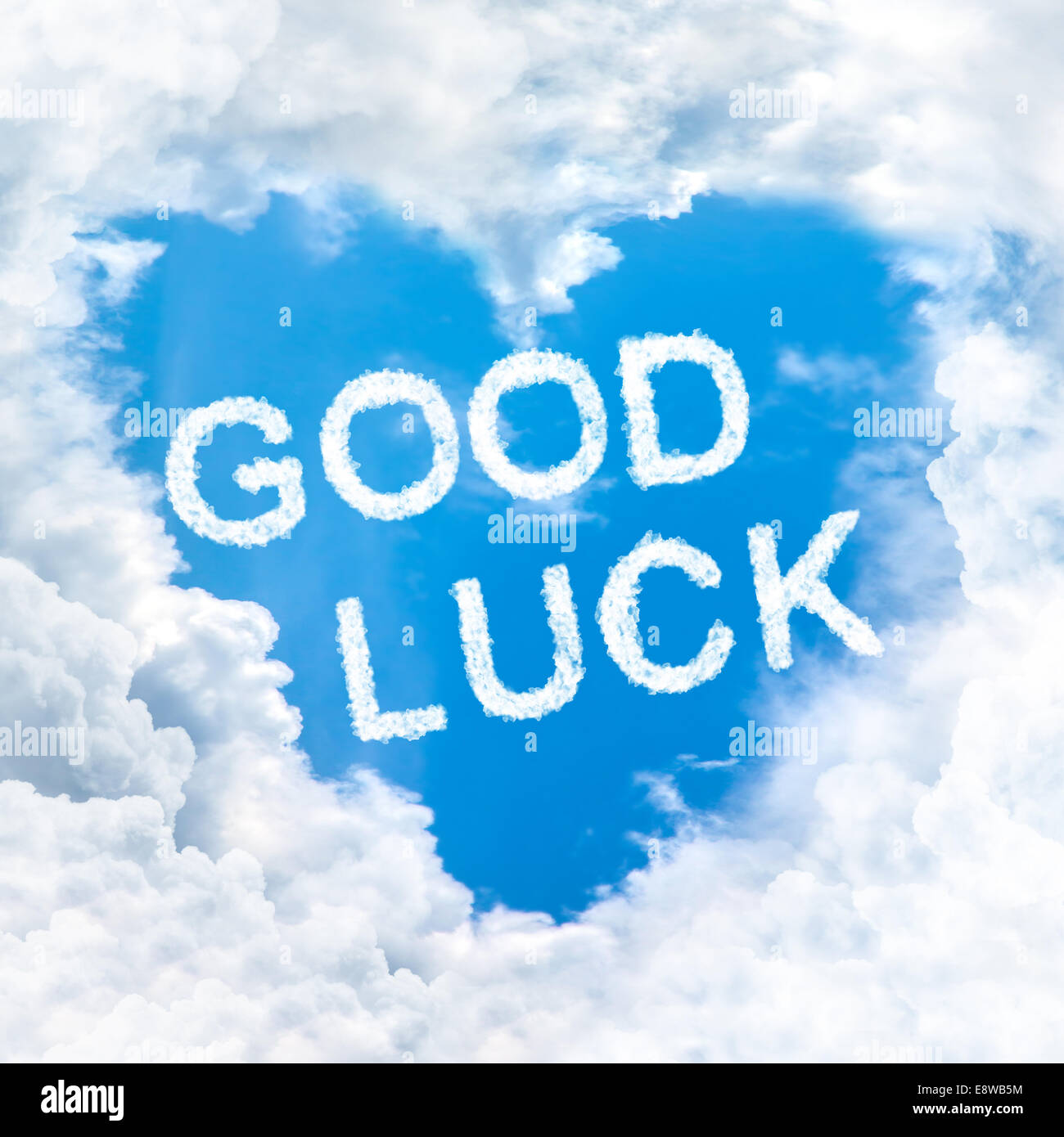 good luck word on blue sky inside heart cloud form Stock Photo - Alamy