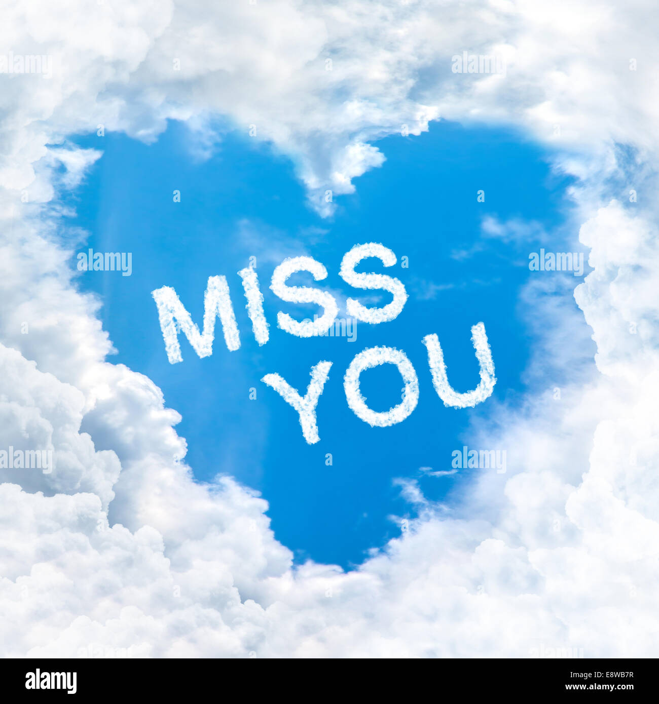 miss you word on blue sky inside heart cloud form Stock Photo - Alamy
