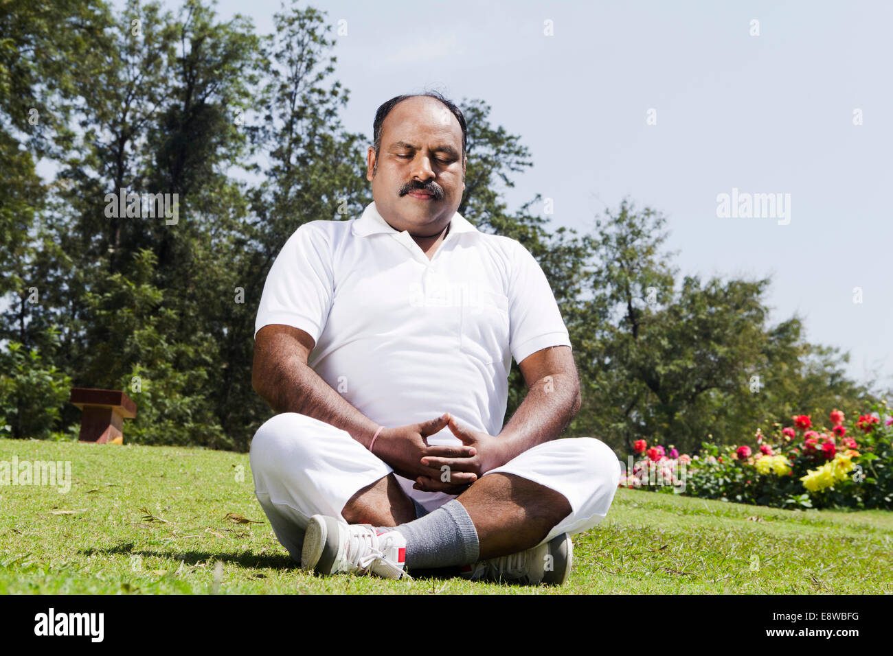 1 Indian Man Exercising in Parks Stock Photo - Alamy