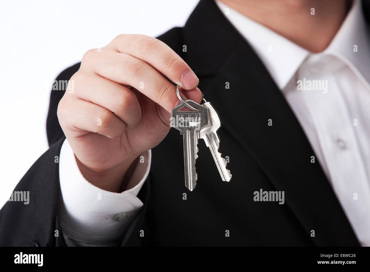Hand the keys Stock Photo - Alamy