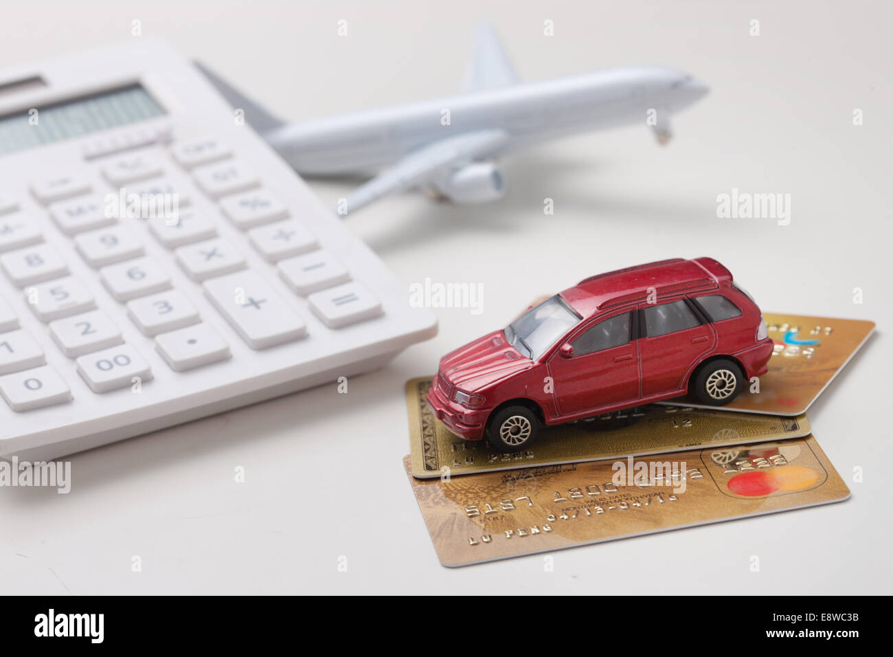 car model calculator bank cards Stock Photo - Alamy