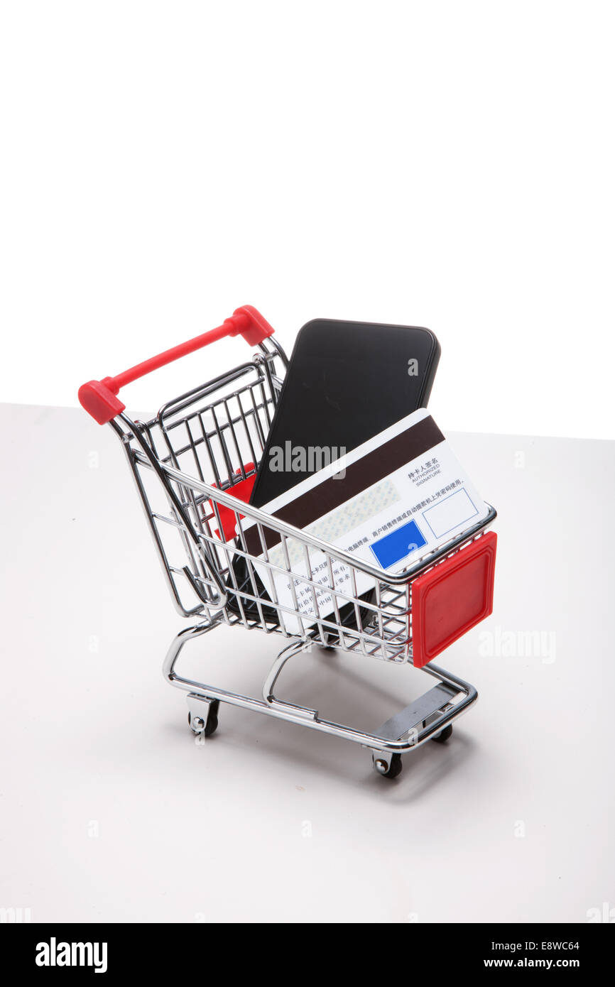 electronics in shopping cart Stock Photo - Alamy