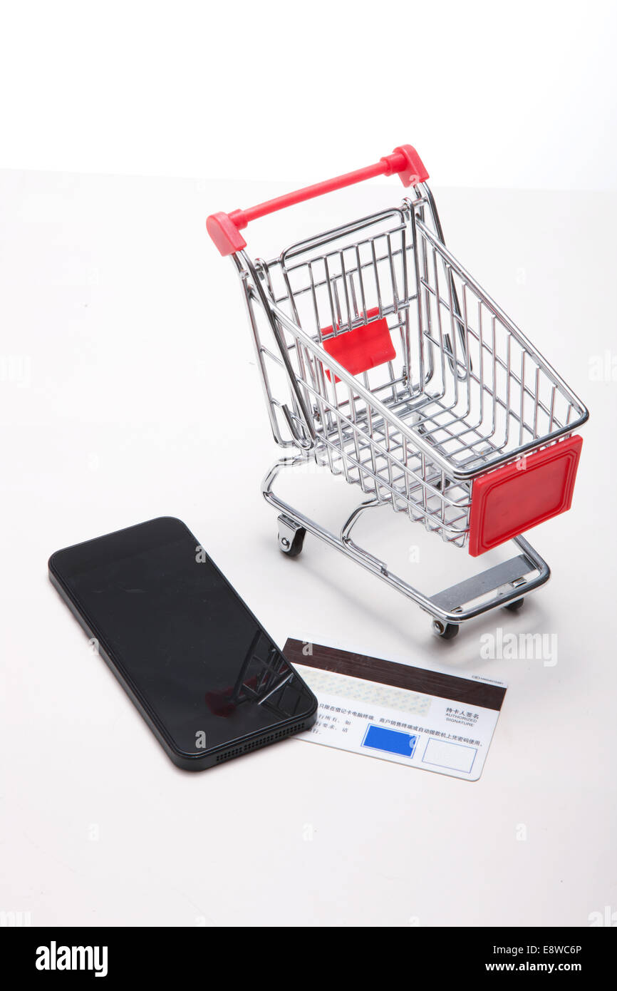 electronics in shopping cart Stock Photo - Alamy