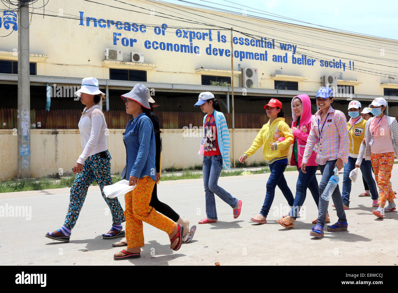 Female textile worker shift change outside a garment factory in the ...