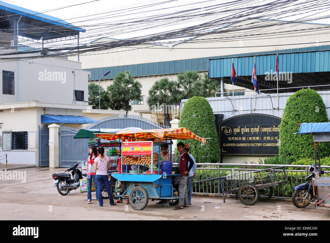 gate of a textile factory in the Pochentong industrial area in Phnom ...